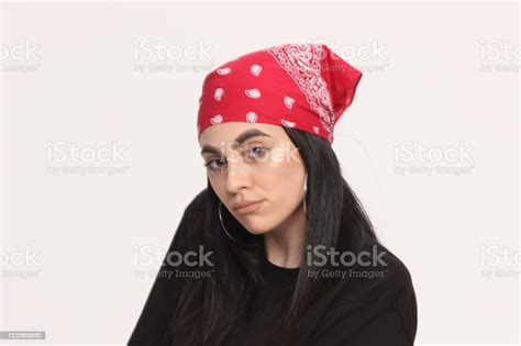 Beautiful Caucasian Hipster Girl With Black Hair And Glasses Is Posing
