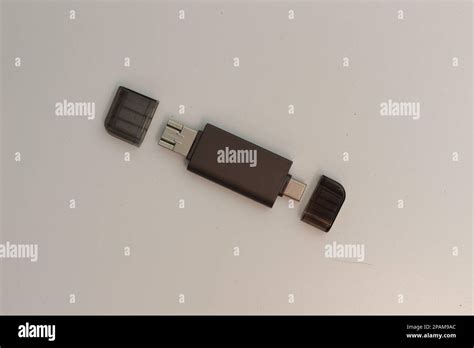 A Close Up Of Multifunction USB OTG Adapter Type A To Type C And Micro USB Type Which Is Gray