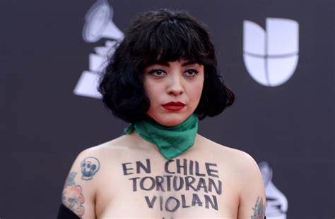 Chilean Singer Flashes Bare Chest With Message Of Protest On Latin