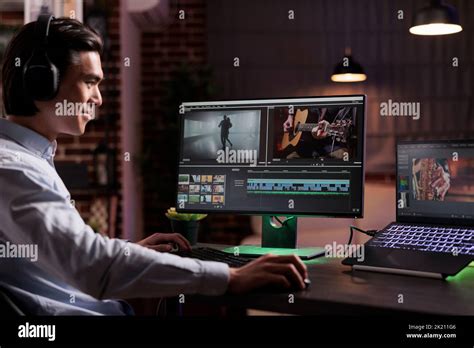 Male Videographer Editing Movie Footage With Media Software Working On Film Montage Production