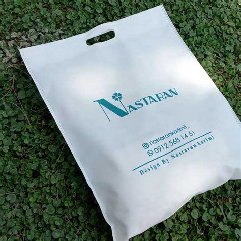 بگ پارچه ای 40 50 دسته پانچی رنگ سفید با چاپ رنگی چاپ شایان