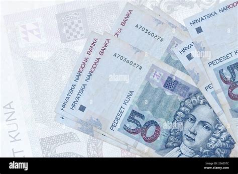 50 Croatian Kuna Bills Lies In Stack On Background Of Big Semi