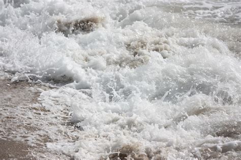 Premium Photo Waves Splashing In Sea