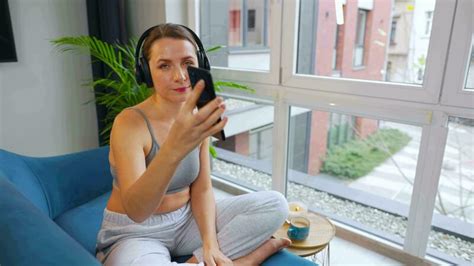 Using Headphones Stock Video Footage For Free Download