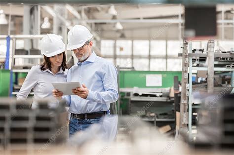 Engineers Using Digital Tablet Stock Image F015 5014 Science