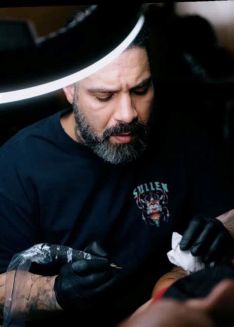 Sacred Art Tattoo