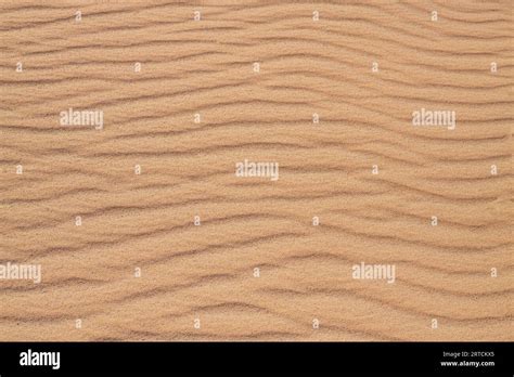Desert Sand Pattern During The Day Light Wave Sand Parttern Of The