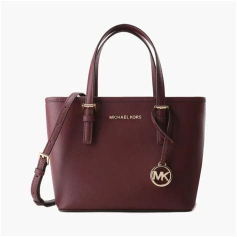 迈克高仕michael Kors 酒红色 Jet Set Travel 超小号斜挎包 小迈步海淘品牌官网