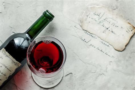 Premium Photo White Wine In Glass And Bottle On White Background