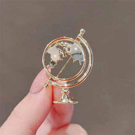 World Globe Inspired Brooch From Apollo Box