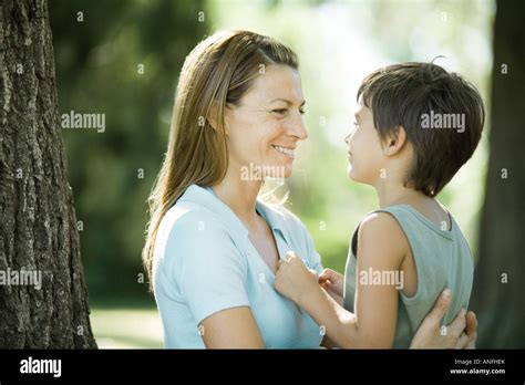 Mother And Son Outdoors Face To Face Stock Photo Alamy