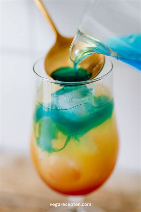 Rainbow Paradise Cocktail With Blue Curacao Vega Recepten Recept