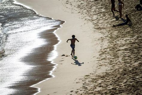 View Of People At Paciencia Beach In Salvador Having Fun And Sunbathing
