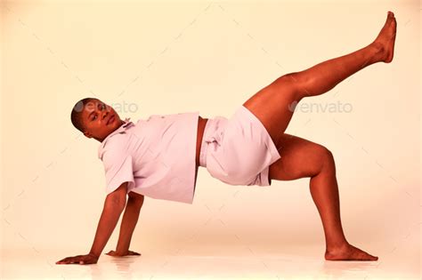Taking Break Overjoyed Millennial Plus Size Black Woman Wearing White T Shirt And Shorts