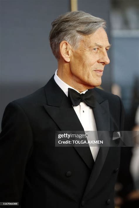 British Actor Douglas Reith Poses On The Red Carpet Upon Arrival For