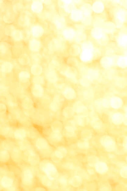 추상적 인 황금 배경 황금 Bokeh 세로 사진 프리미엄 사진