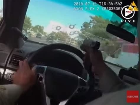 Watch Officer Shoots Through Windshield While Chasing Suspects