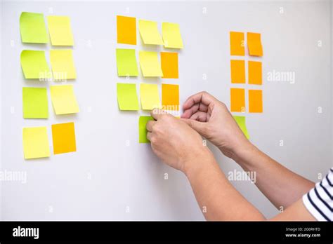 It Worker Tracking His Tasks On Kanban Board Using Task Control Of