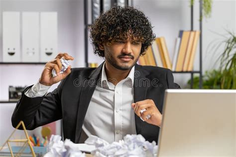Angry Furious Man Working At Home Office Throwing Crumpled Paper