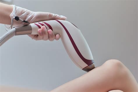 Premium Photo Young Woman Getting Laser Hair Removal On Her Thighs