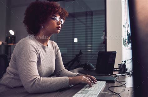 Night Computer Typing And Black Woman Programmer Software Developer And Cybersecurity