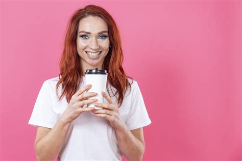 Winsome Female With Ginger Hair Using Disposable Cup Of Ta Flickr