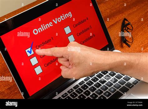 Person Voting On The Computer Over The Internet With The Text Online