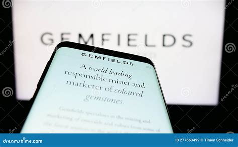 Mobile Phone With Website Of Mining Company Gemfields Group Ltd On