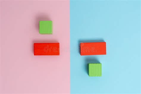 Comparison Of Two Objects Blocks Pencils Sticker Notes Facing Inward