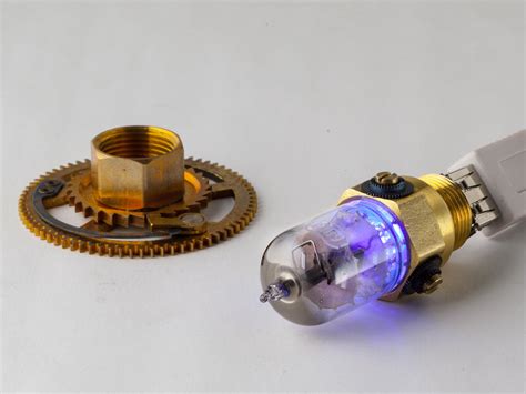 Dark Blue Steampunk Usb Drive With A Vacuum Tube And Brass Clockwork