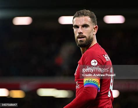 Jordan Henderson Captain Of Liverpool Wearing The Rainbow Captain