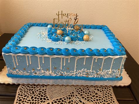 Blue Birthday Cake With Gold Decorations
