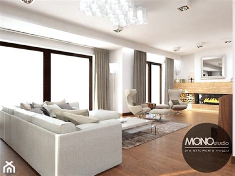 Kuchnia w drewnie z czarnymi akcentami zdjęcie od MONOstudio Homebook