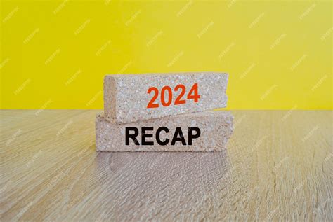Premium Photo 2024 Recap Symbol Concept Orange Words 2024 Recap On