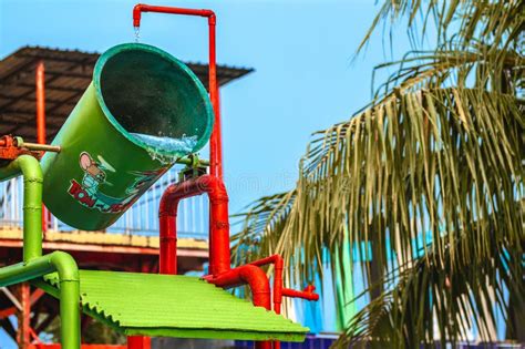 Water Spills On The Water Bucket Attraction In Water Park Water Splash On Tipping Bucket Or