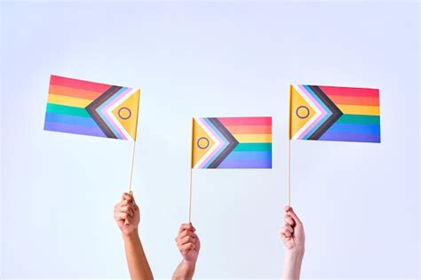 Premium Photo Hands With Lgbtqi Sexual Diversity Flags On White