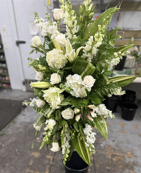 Elegant Embrace Tribute Spray Creative Floral Designs