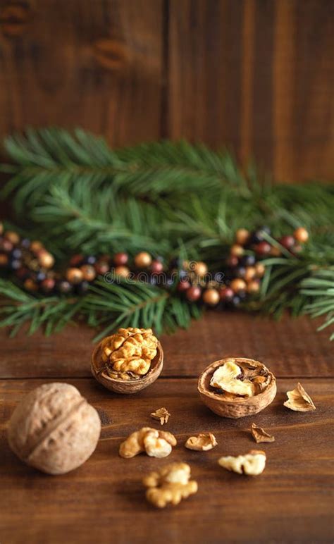 Rustic Background With Walnuts Fir Tree Branch And Colorful Bead Balls