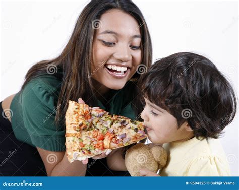 Mother And Daughter Eating Pizza Slice Stock Image Image Of Mother