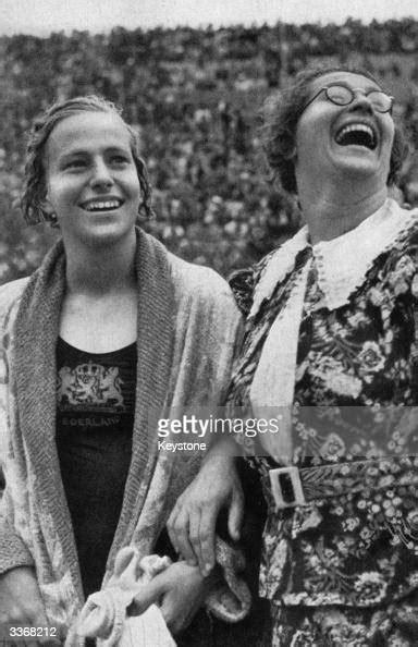 Dina Nida Senff With Her Trainer Celebrate Winning The Olympic 100 News Photo Getty Images