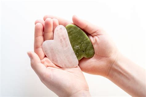 Heart Shaped Massage Stones Two Heart Shaped Stones In The Palms Stock