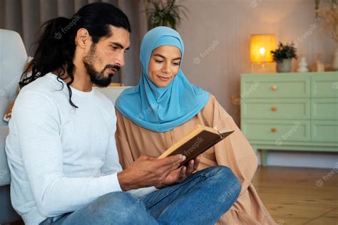 Free Photo Side View Couple Reading Book Together