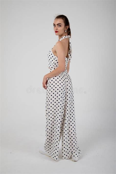 Stunning Model Posing In A White Polka Dot Set Stock Image Image Of