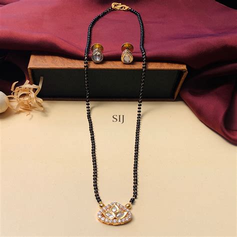 Simple Gold Plated Drop Mangalsutra And Earrings South India Jewels