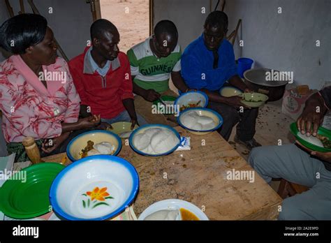 Malawian People Eating Nshima Nsima A Cornmeal Porridge Made In