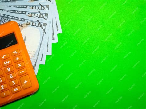 Premium Photo Selective Focus Of Blur Calculator And Banknote On