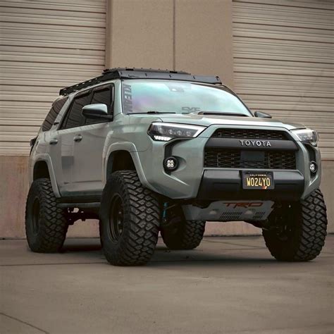 Grey Toyota 4runner Trd Pro Truck Parked In Front Of Garage Door