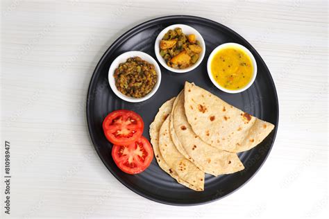 Roti And Bhaji Indian Vegetarian Thali Or Platter Includes Akhha