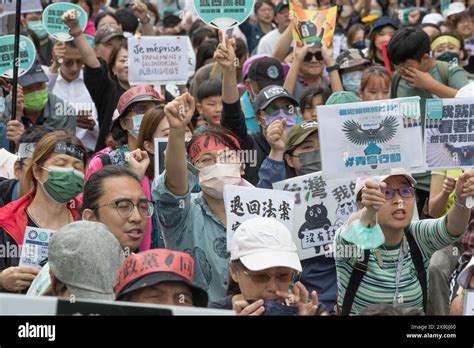 Thousands Of Activists Shout Slogan And Raise Placards A Rally During