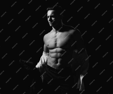 Premium Photo Muscular Guy With Sexy Torso Strong Man Showing His